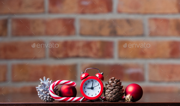 christmas baubles with retro alarm clock Stock Photo by Masson-Simon