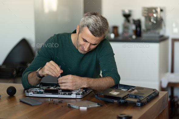 Laptop repair. Disassembled computer parts. PC electronic components ...