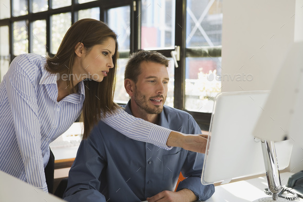 Business people in office using computer Stock Photo by westend61 ...