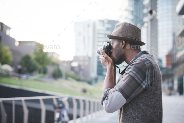 young black man outdoor using camera Stock Photo by peus80 | PhotoDune