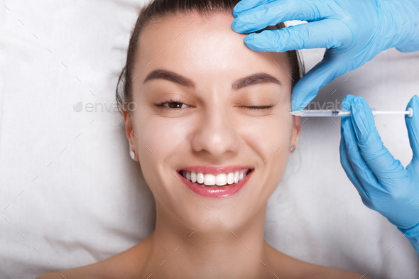 Facial Beauty Injections. Portrait Beautiful Young Woman Receiving ...