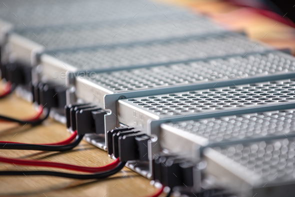 Metal mesh cases of power supply and wires Stock Photo by YouraPechkin