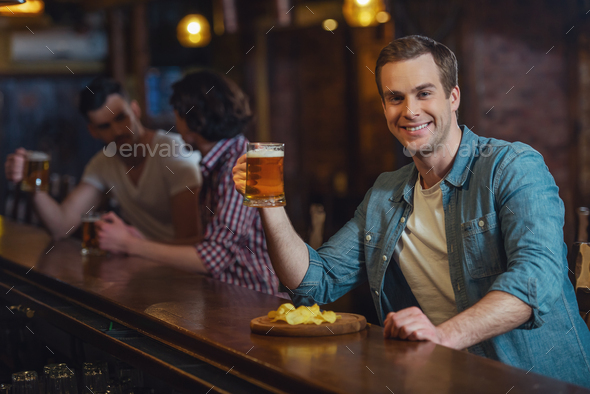 Men in pub Stock Photo by GeorgeRudy | PhotoDune