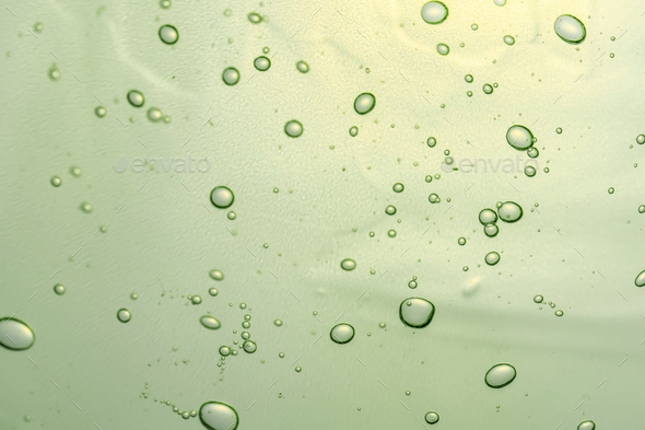 Green gel texture of a cosmetic care product. Stock Photo by marevgenna1985