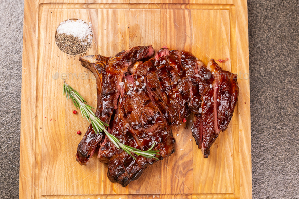 Food, delicious, horse meat and craft concept - serving of grilled ...