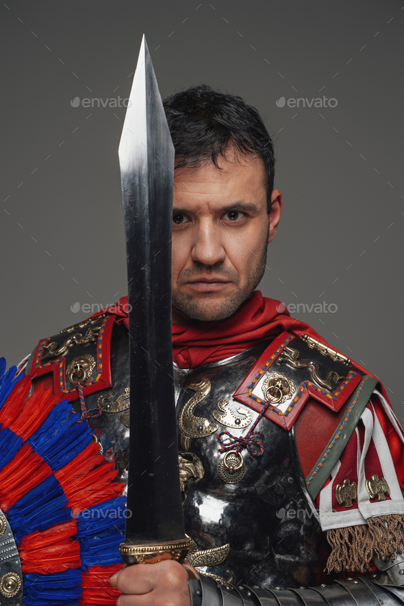 Portrait of ancient roman centurion against gray background Stock Photo ...