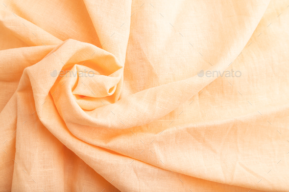 Fragment of orange linen tissue. Top view, natural textile background ...