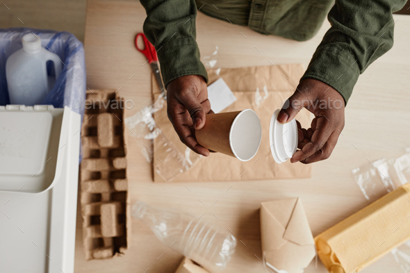 Preparing Waste Items for Recycling Stock Photo by seventyfourimages