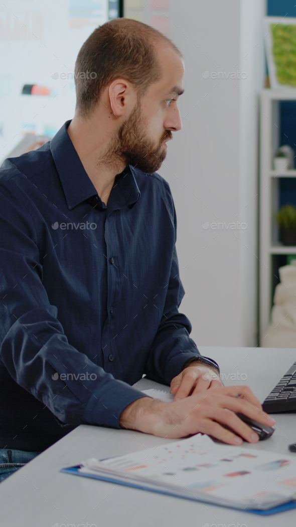 Corporate employee taking notes for project planning Stock Photo by DC ...