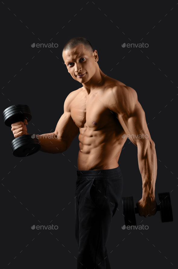 Male bodybuilder posing in studio Stock Photo by serhiibobyk | PhotoDune