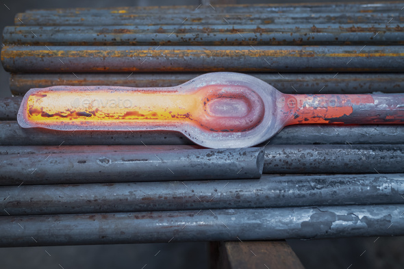 Hot forged steel part in industrial forge Stock Photo by Image-Source