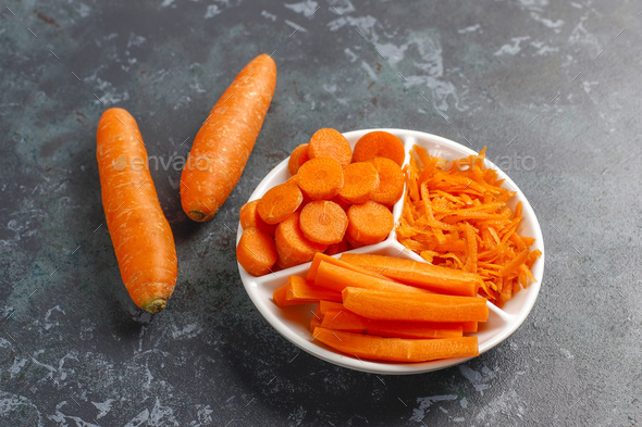 Different cuts of carrot in bowls. Stock Photo by 13people | PhotoDune