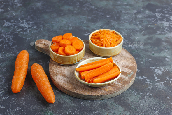 Different cuts of carrot in bowls. Stock Photo by 13people | PhotoDune