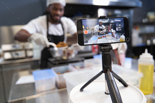 American chef shooting online video cooking lesson Stock Photo by svitlanah