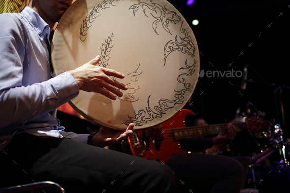 Musician man playing def instrument Stock Photo by Pasanheco | PhotoDune