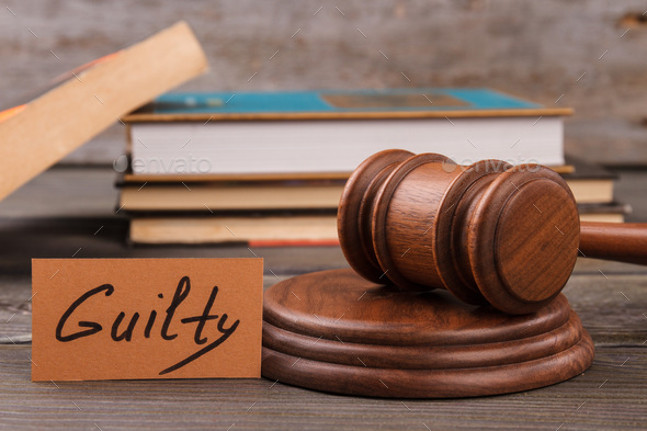 Gudge gavel and guilty verdict. Stock Photo by stockfilmstudio | PhotoDune