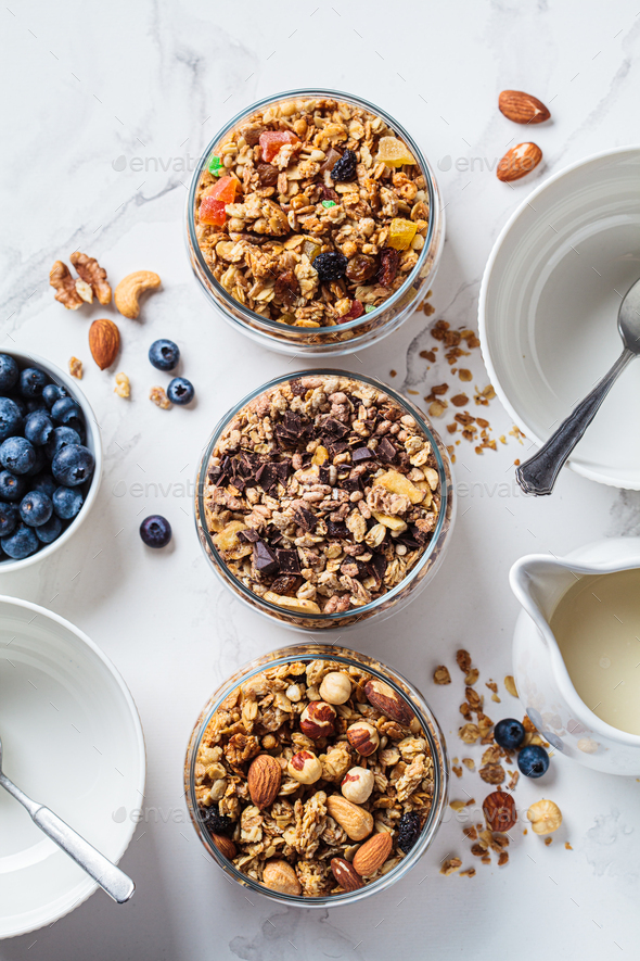 Different types of homemade granola Stock Photo by vaaseenaa | PhotoDune