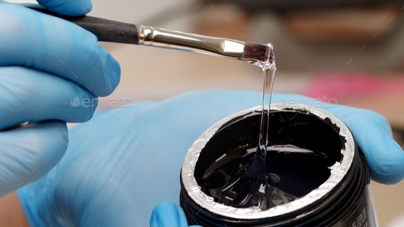 The preparation process before applying shellac in a beauty salon ...