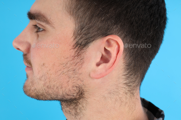 Side view photo of young man head on blue background Stock Photo by ...