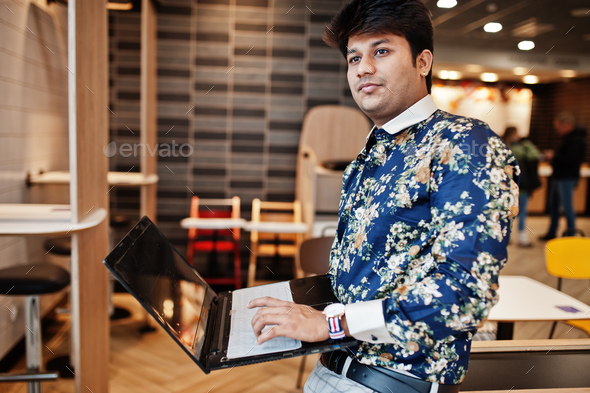 Indian man at fast food cafe Stock Photo by ASphotostudio | PhotoDune