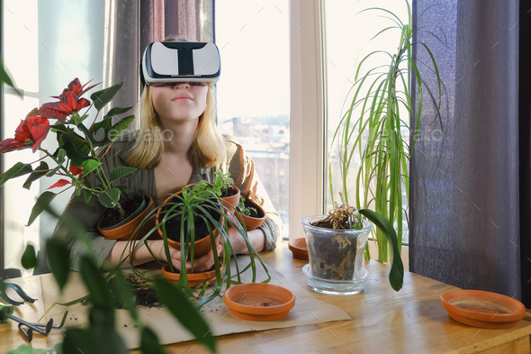 Gardening.Virtual world, metaverse.Girl planting flowers in immersive ...