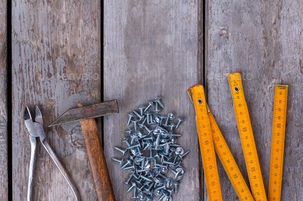 Set of carpenters tools on wooden background Stock Photo by stockfilmstudio