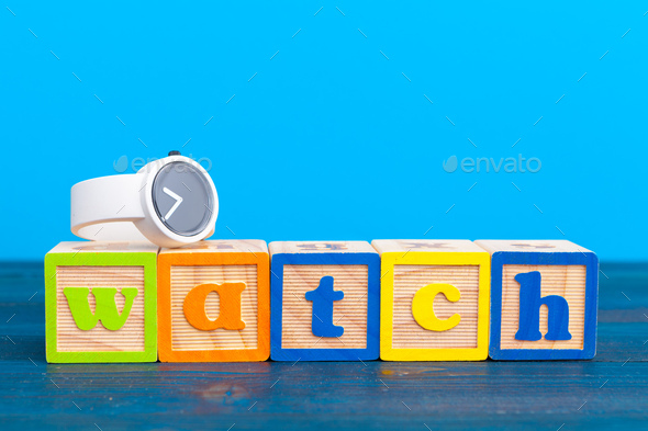 cube wooden block with alphabet building the word watch Stock Photo by ...