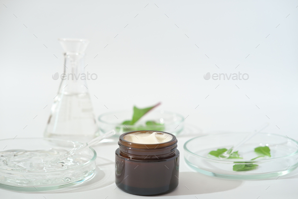 laboratory developed cream with natural ingredients. lab glassware ...