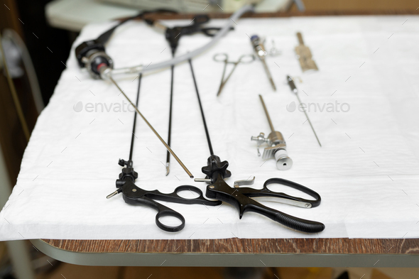Laparoscopic instruments on the operating table in the surgical room ...