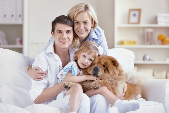Happy family with a dog Stock Photo by AboutImages | PhotoDune