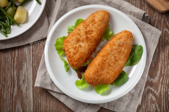 Breaded Fish Fillet With Potato and Green Beans Salad. Stock Photo by ...