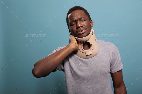 Hurt adult using neck collar to heal fractured vertebrae on camera ...