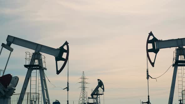 Petrol Extraction Site with Several Oil Derricks, Stock Footage | VideoHive