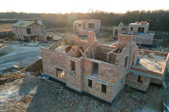 Industrial building site in rural area with residential houses under ...