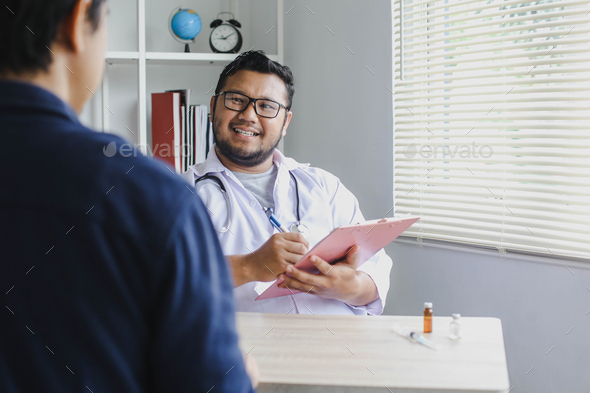 Doctor interview the patient Stock Photo by Garakta-Studio | PhotoDune