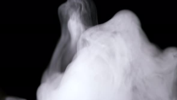 Dense Flow of Steam Vaporing Into Air in Dark Studio Room, Stock Footage