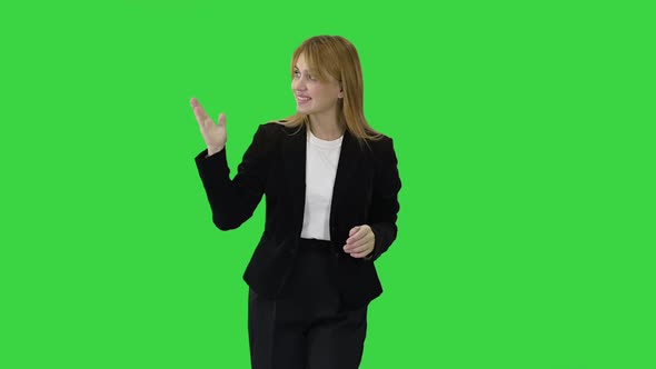 Female Presenter Blond Woman Walking and Pointing To the Sides on a ...