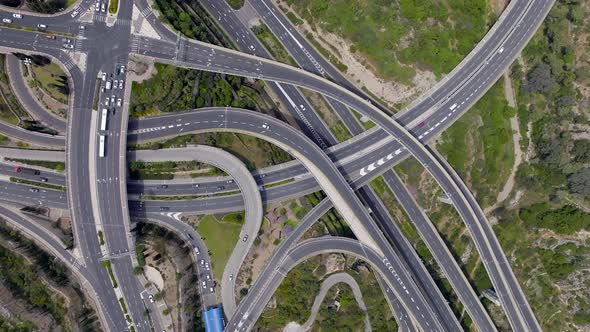 Massive multi level highway interchange with traffic on all routes ...
