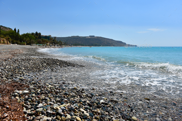 Beach with pebble stones. Summer vacation concept. Pissouri bay, Cyprus ...