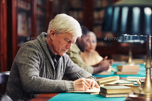 Senior Man in Classic Library Stock Photo by seventyfourimages | PhotoDune