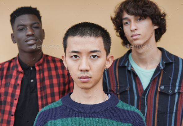 Young multiracial boys looking serious - Diversity and friendship ...