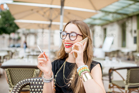 Smoking woman at the french cafe Stock Photo by RossHelen | PhotoDune