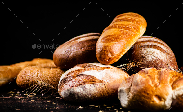 Different types of fresh homemade bread. Stock Photo by Artem_ka2 ...