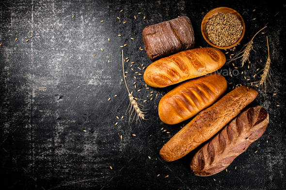 Different types of fresh homemade bread. Stock Photo by Artem_ka2 ...