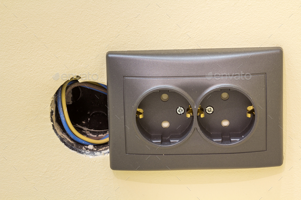 New gray power outlet socket with electric isolated colorful wires ...