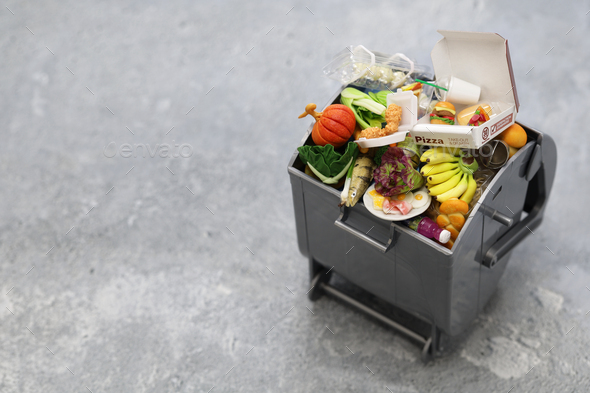 Garbage trash can, Image of food waste made in miniature. Stock Photo ...