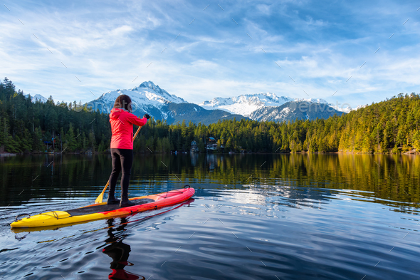 Adventurous Girl Paddle Boarding on Levette Lake with famous Tantalus ...