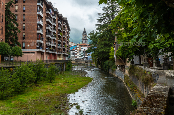 Traditional houses in the town of Azkoitia next to the Urola river ...