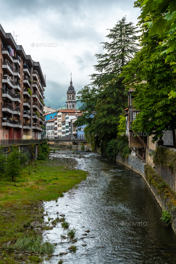 Traditional houses in the town of Azkoitia next to the Urola river ...