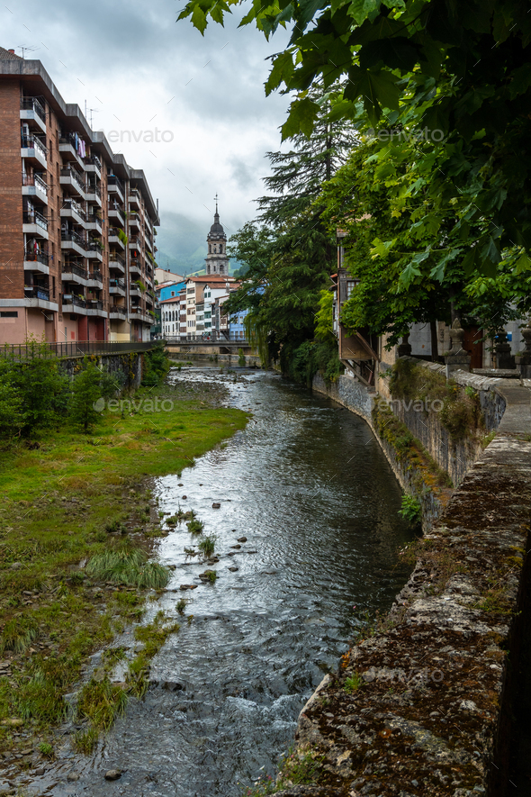 Traditional houses in the town of Azkoitia next to the Urola river ...
